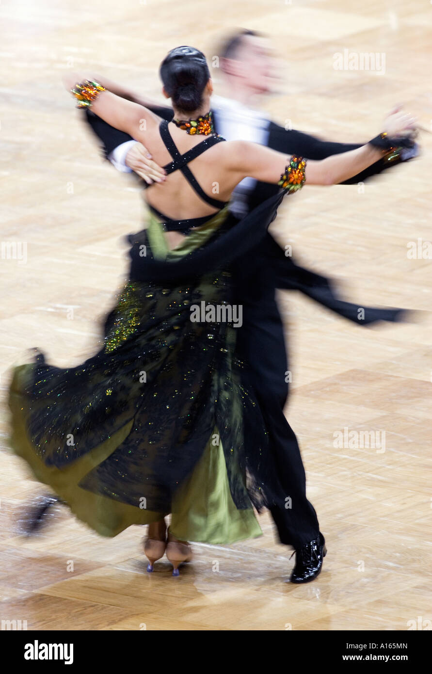 Professional ballroom dancers performing in the Standard Dance ...