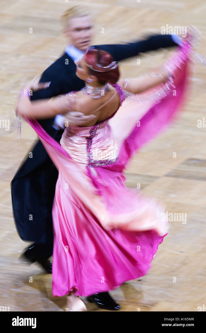 Professional ballroom dancers performing in the Standard Dance ...