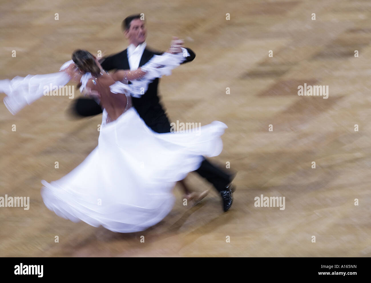 Professional ballroom dancers performing in the Standard Dance ...