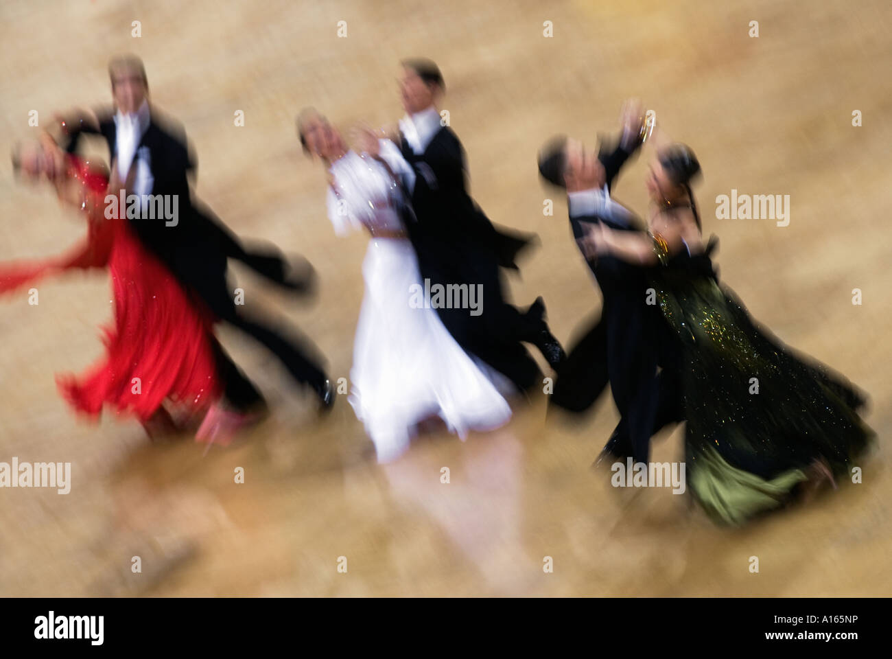 Professional ballroom dancers performing in the Standard Dance ...