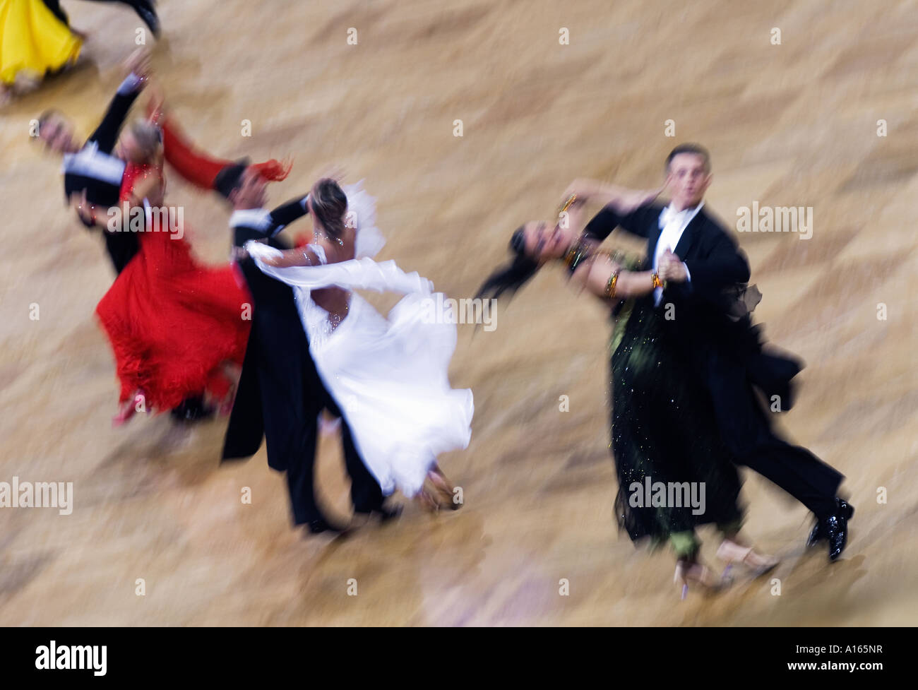Professional ballroom dancers performing in the Standard Dance ...