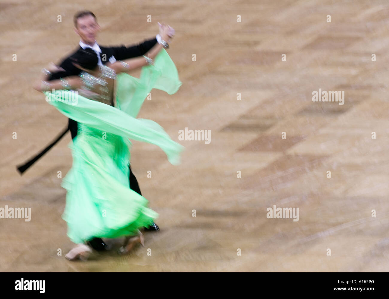 Professional ballroom dancers performing in the Standard Dance ...