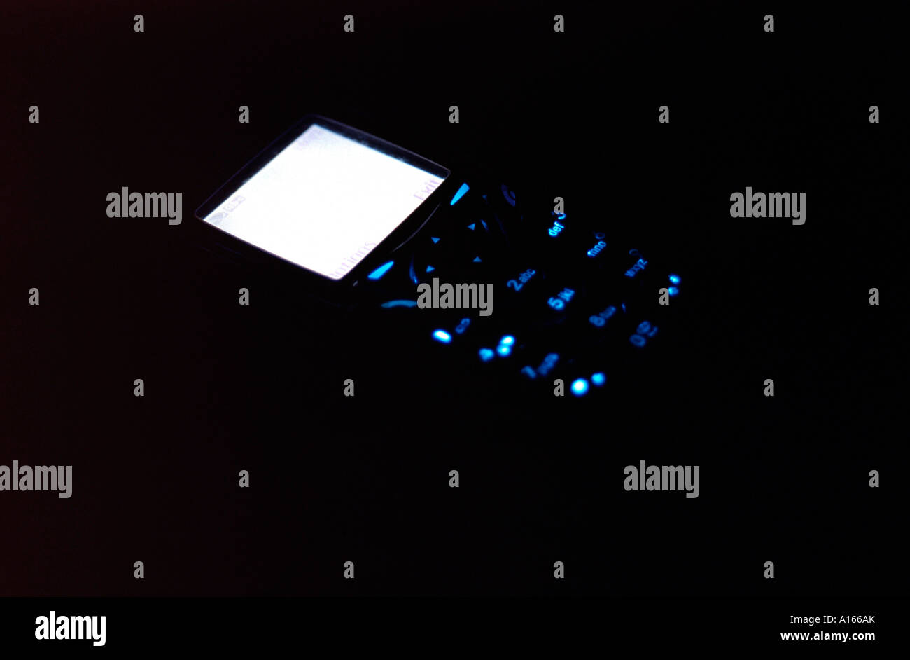 Illuminated mobile phone from the early 2000s Stock Photo - Alamy