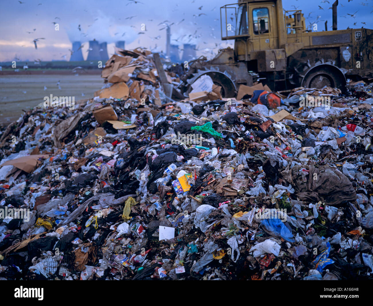 Bulldozing waste on land fill site Warrington Cheshire England UK Stock ...