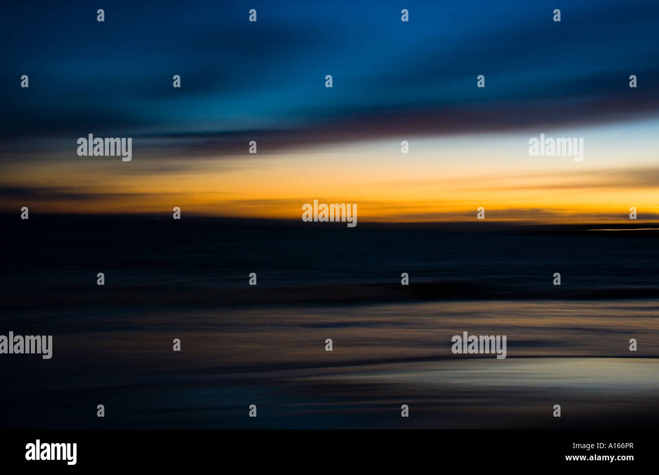 Abstract Beach at sunset Stock Photo - Alamy
