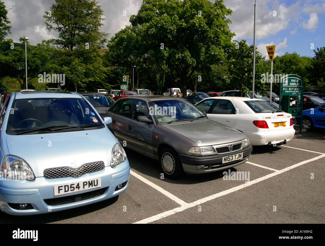 Cars parked in a public pay and display car park in England Stock Photo ...