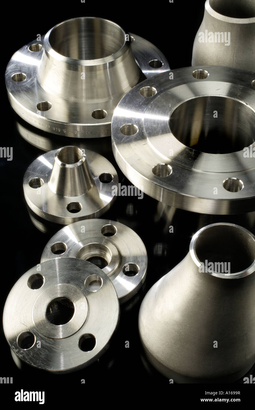 Stainless Steel Pipe Components on black background Stock Photo - Alamy