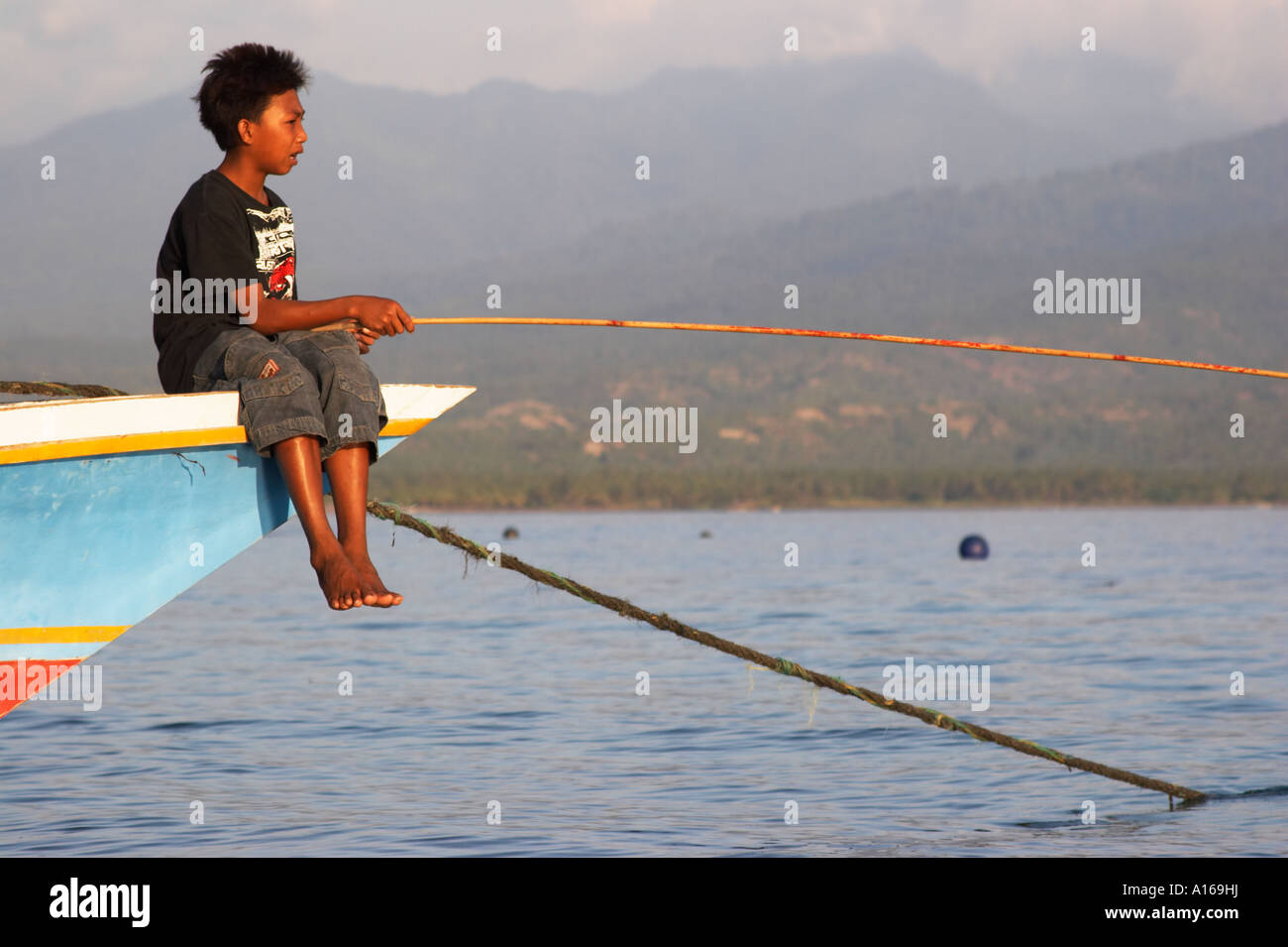 Child fishing legs hi-res stock photography and images - Alamy
