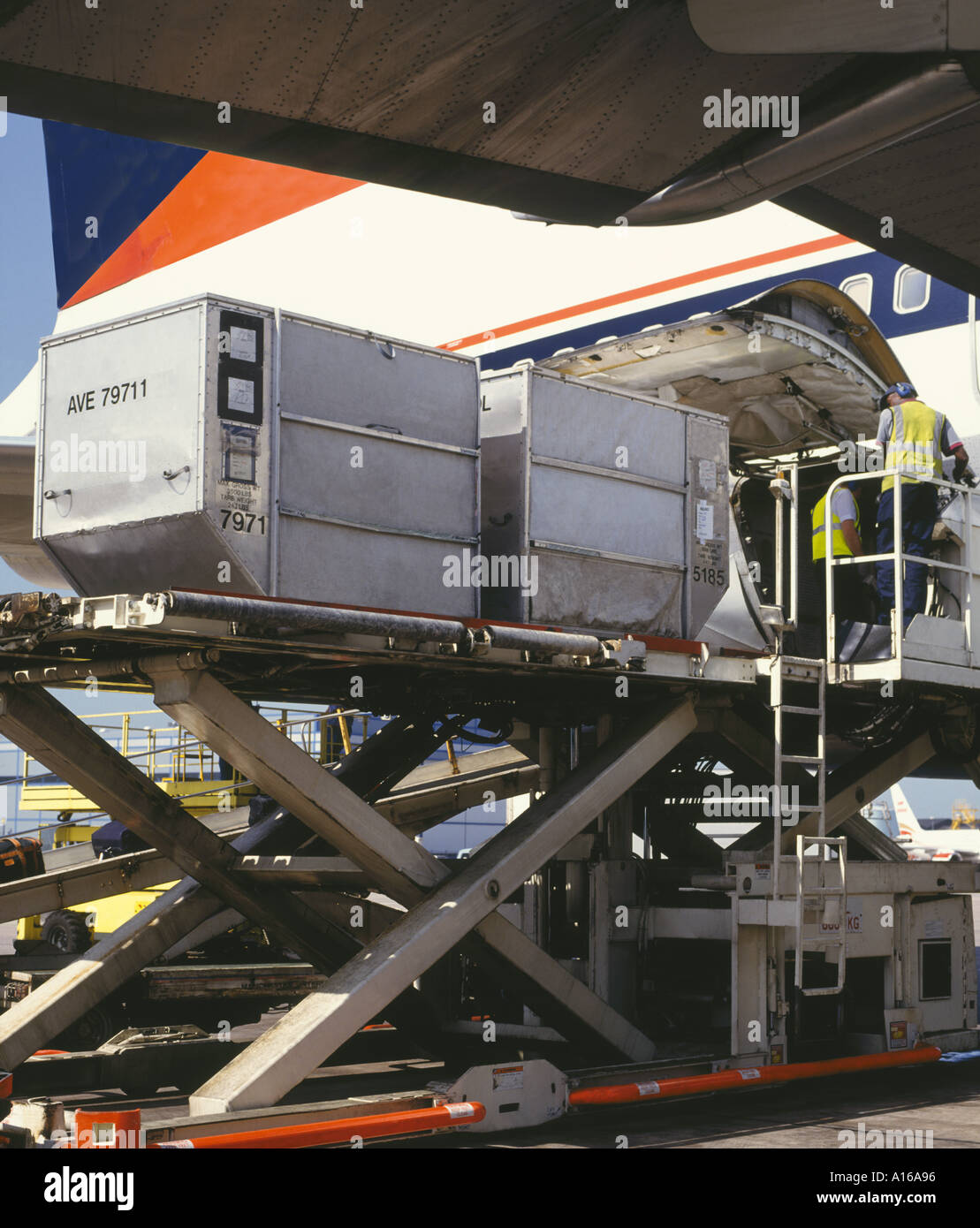 Aviation industry. Loading cargo into cargo hold of an airliner Stock ...