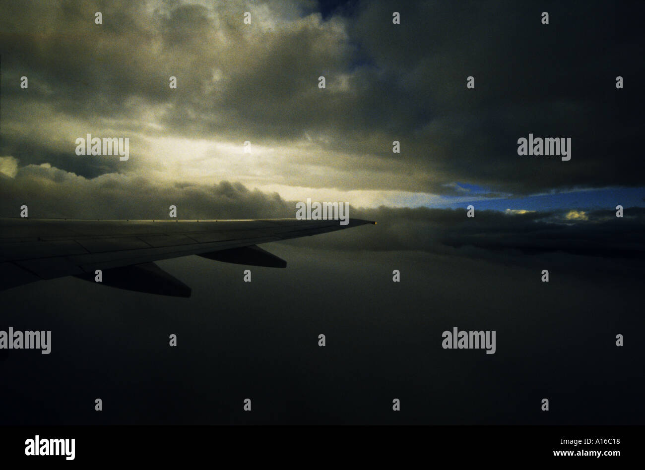 Dark clouds during flight Stock Photo - Alamy
