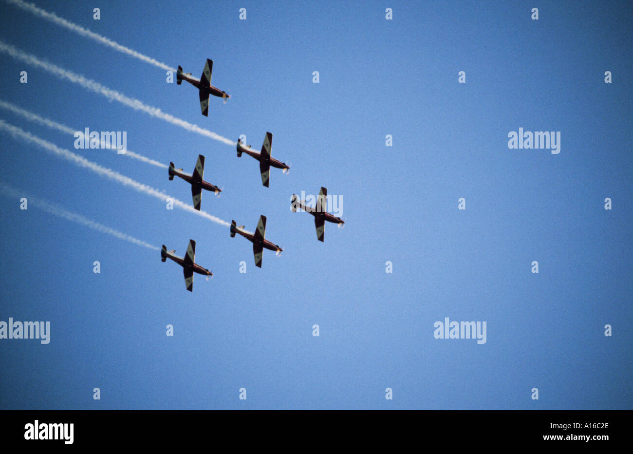 Flying trailing white smoke formation hi-res stock photography and ...