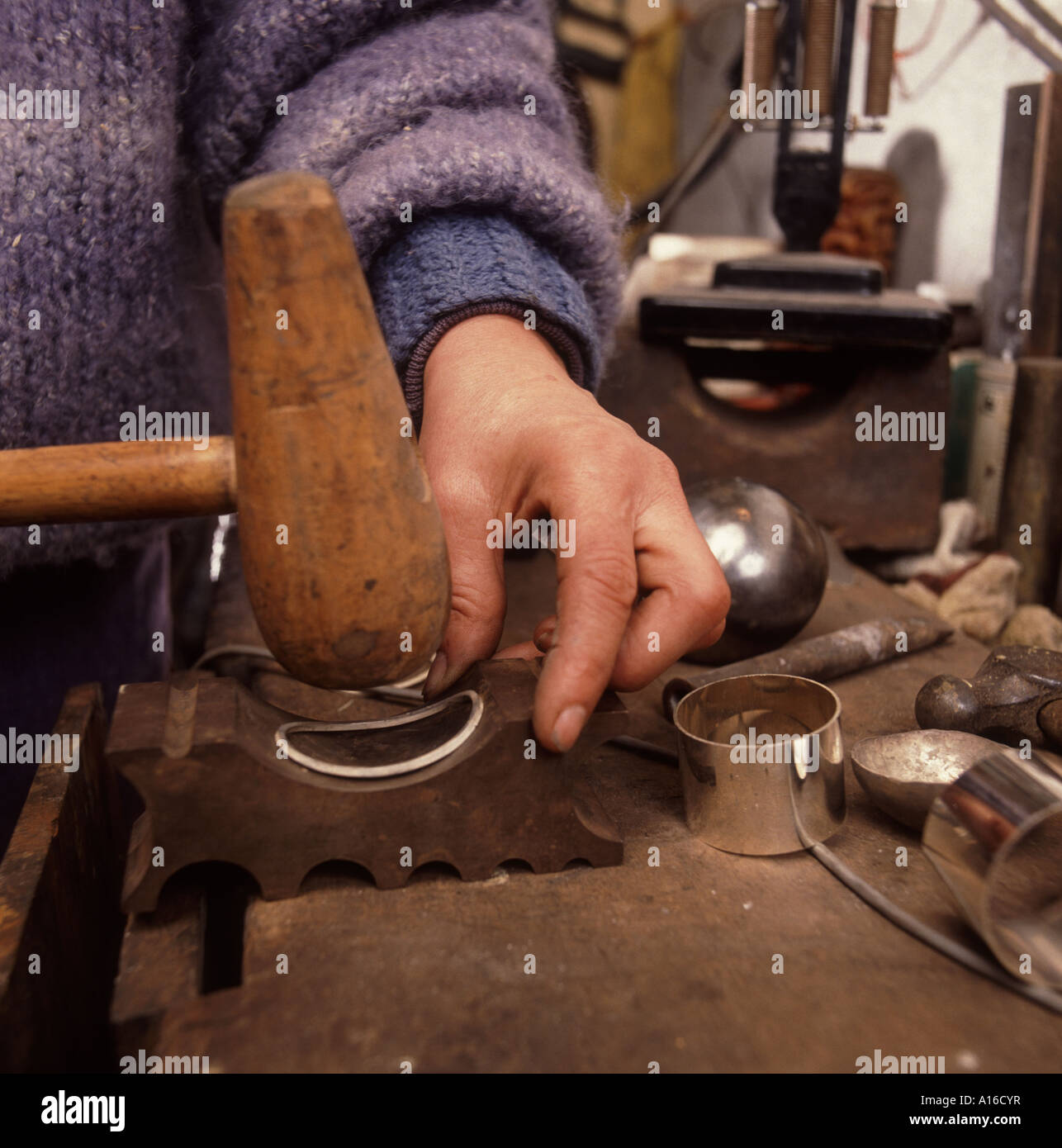 A traditional silversmith at work on jewellery Stock Photo - Alamy
