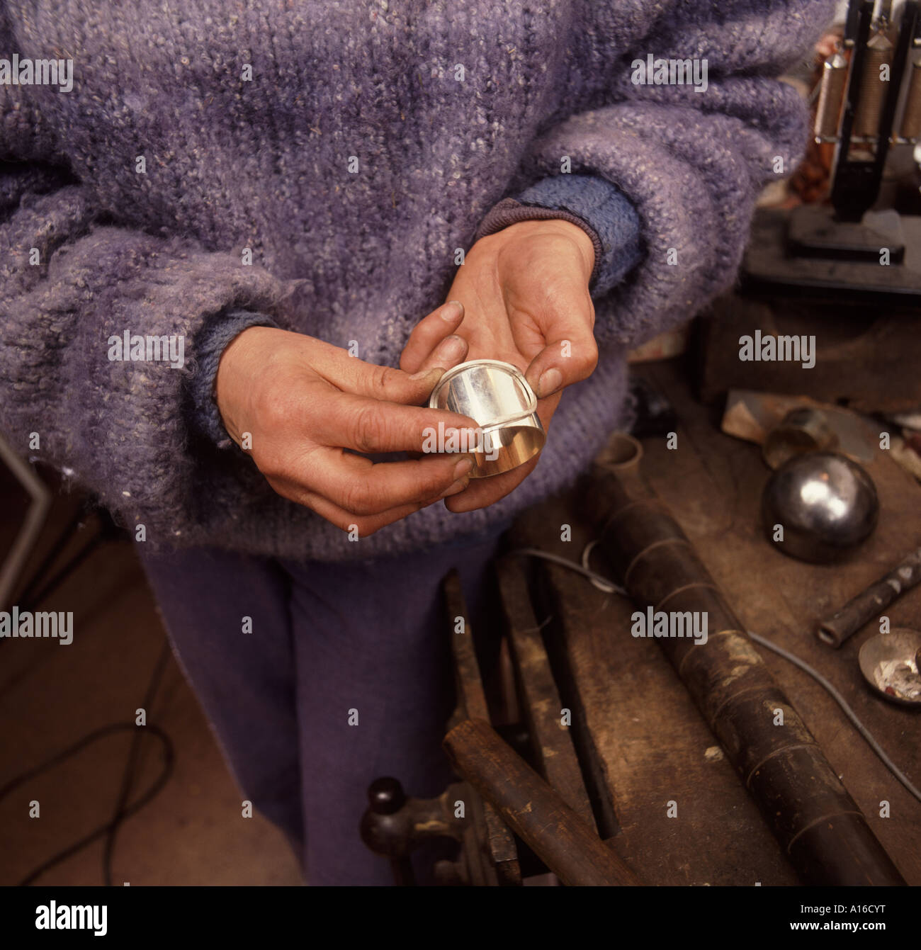 A traditional silversmith at work on jewellery Stock Photo - Alamy