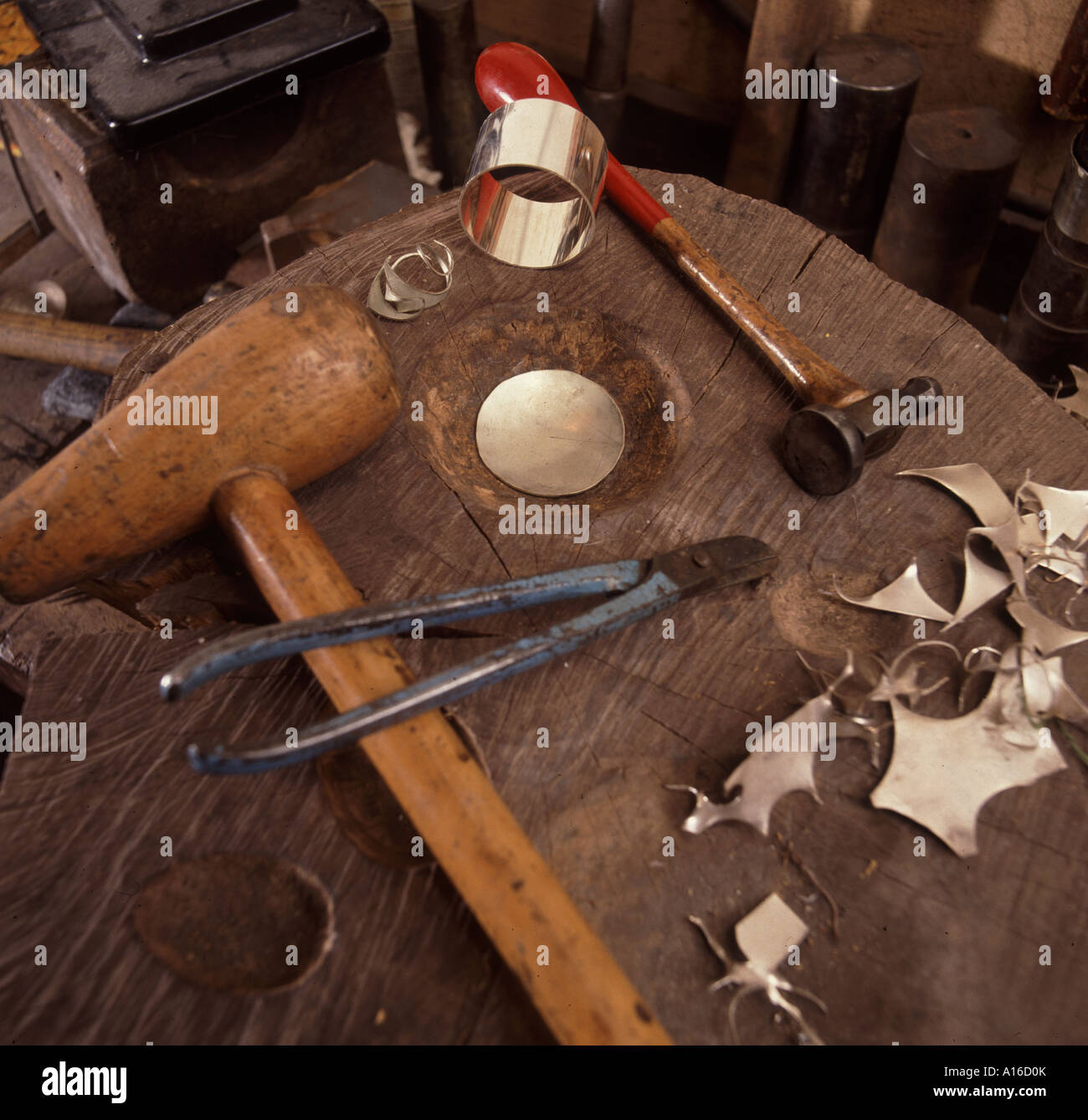 The tools of traditional silversmith working on jewellery Stock Photo ...
