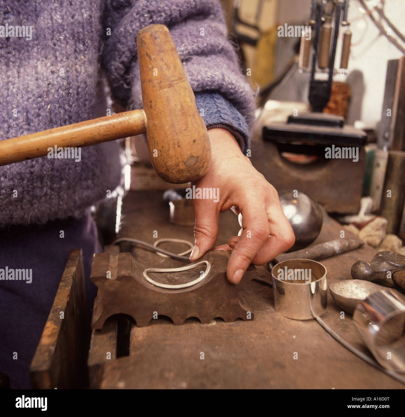 A traditional silversmith at work on jewellery Stock Photo - Alamy