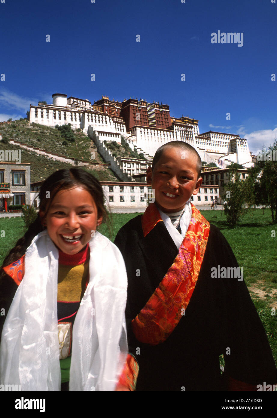 Tibetan children in front on Potala Palace in Lhasa Tibet Stock Photo ...