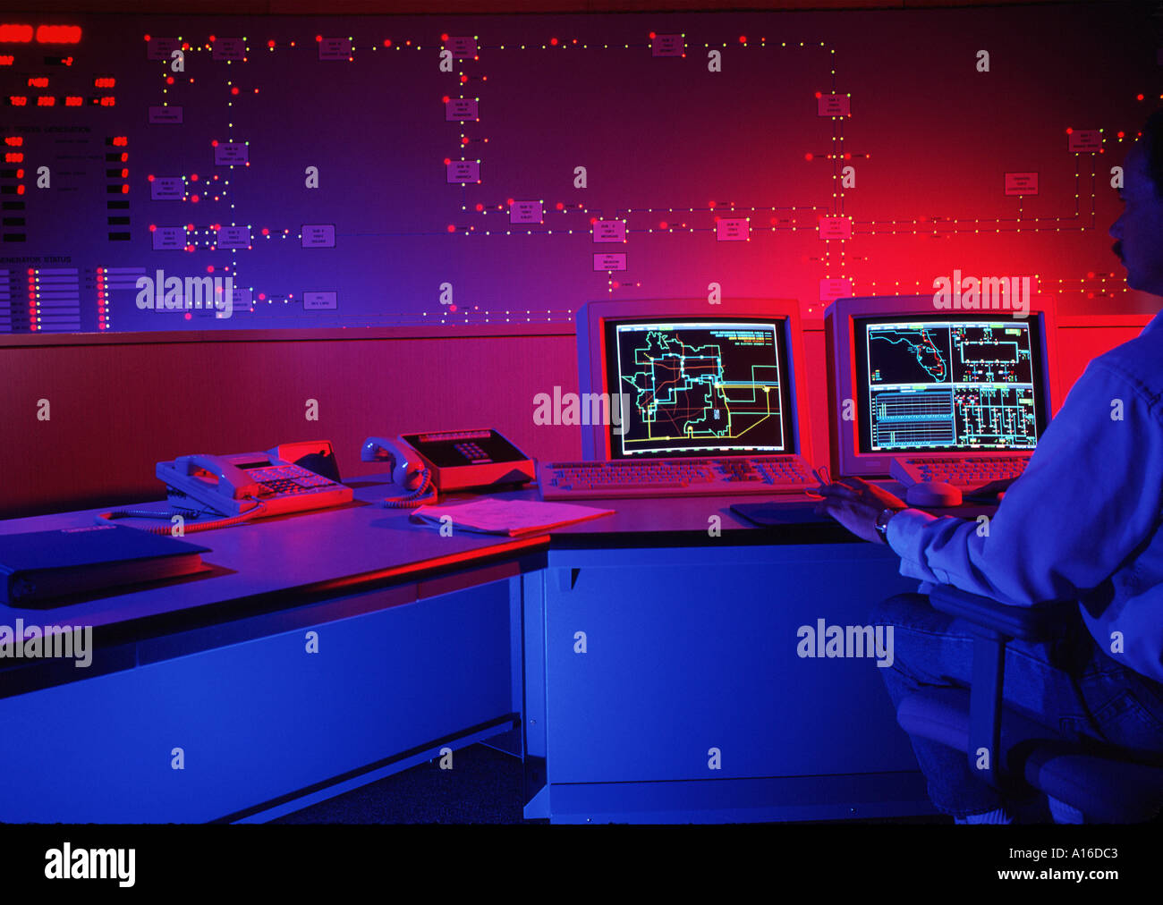 Electricity Worker with computer showing power flow charts Stock Photo ...