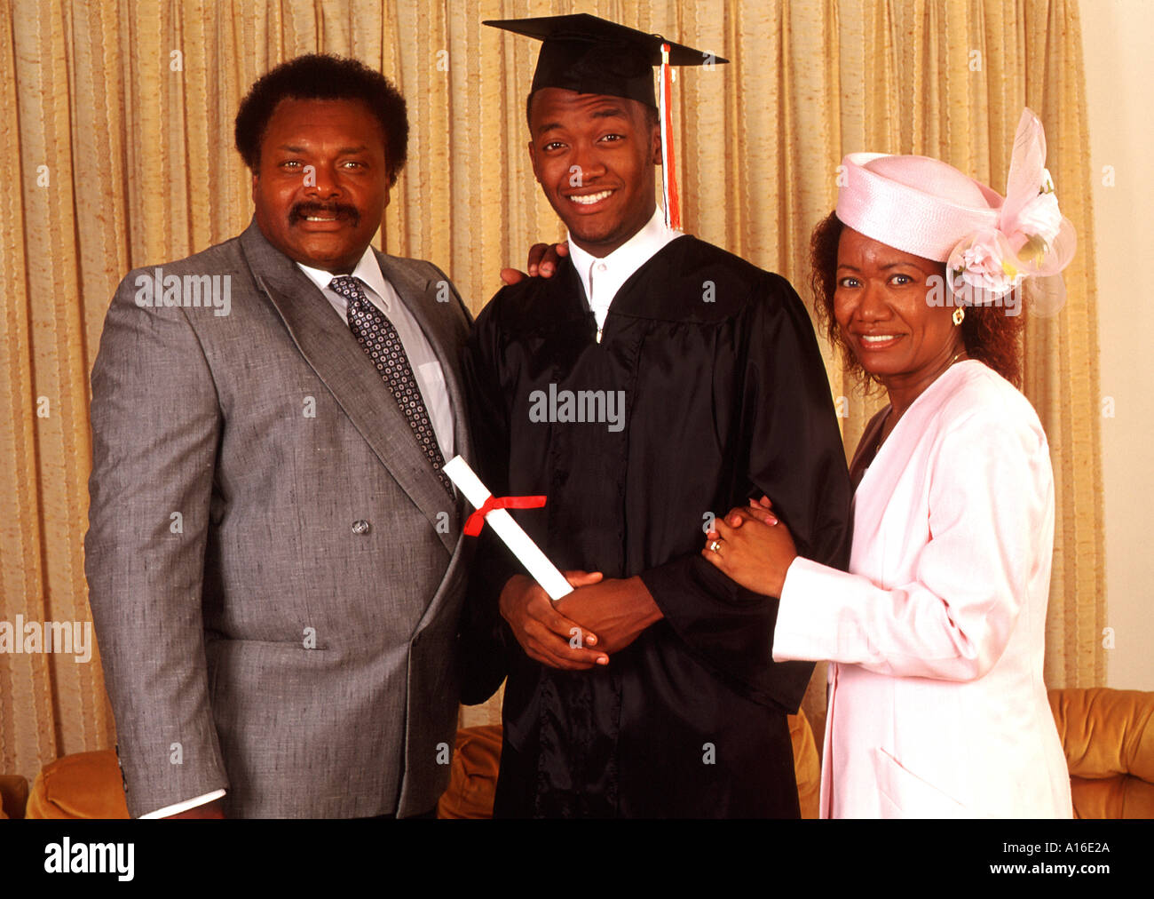 High school graduation Black family celebrating Stock Photo - Alamy