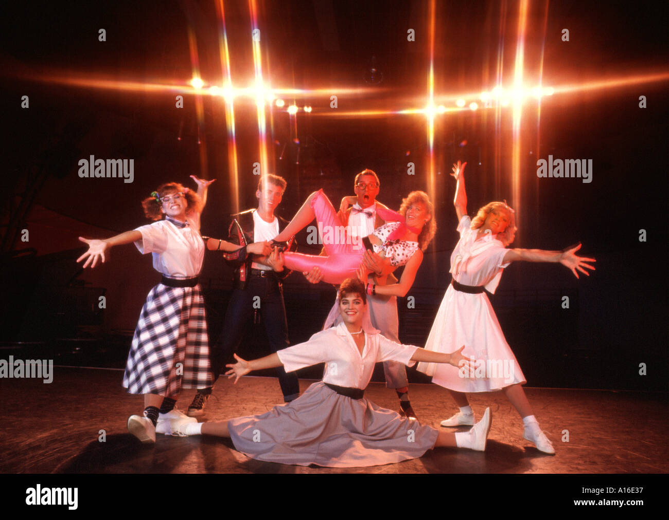 College Students in theater class putting on play showing 1950s dance ...