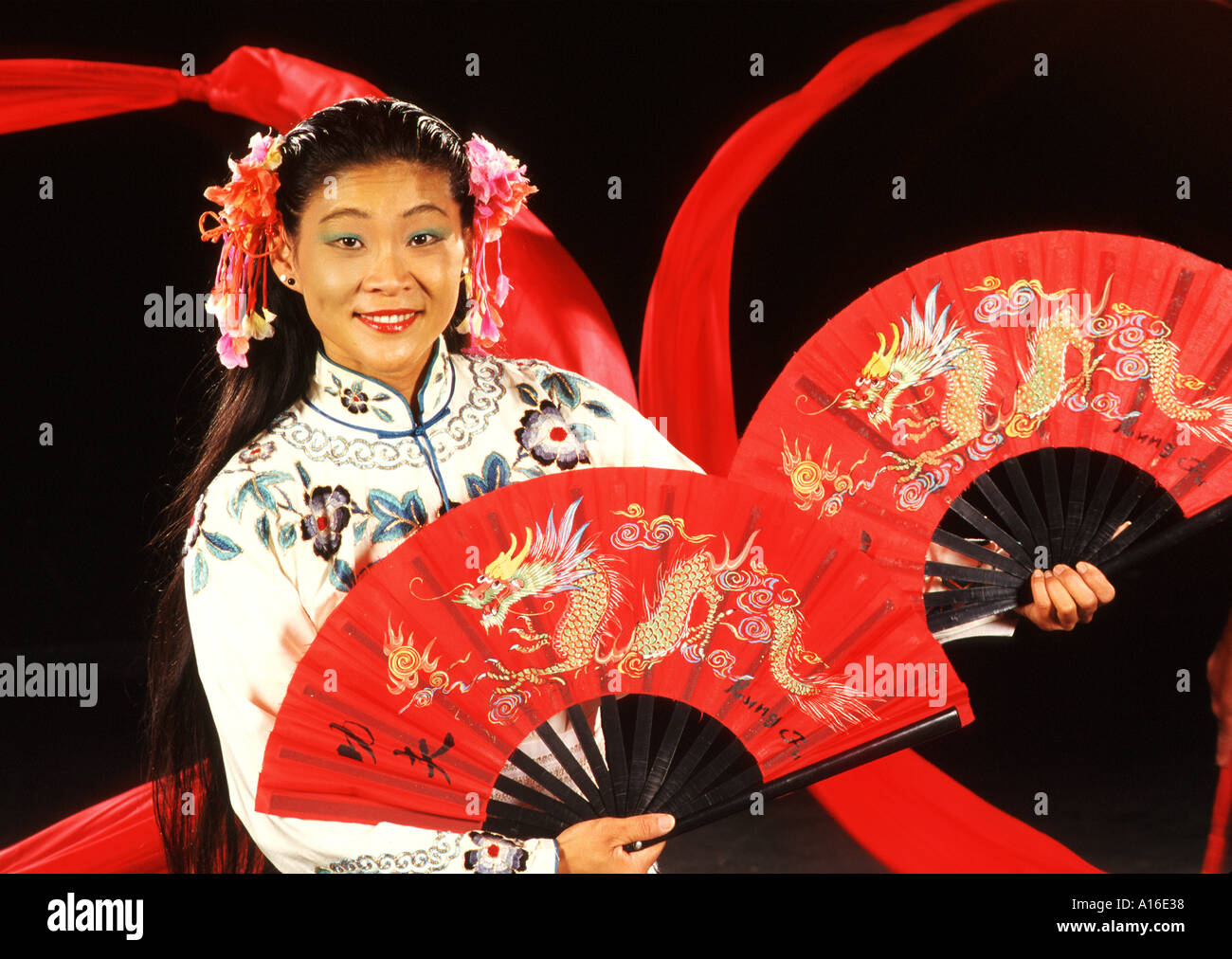 Attractive young Asian woman with fans ribbons traditional art Stock ...