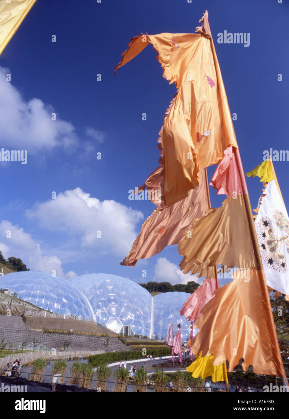 Flags flying outside the worlds largest conservatory housing a tropical ...