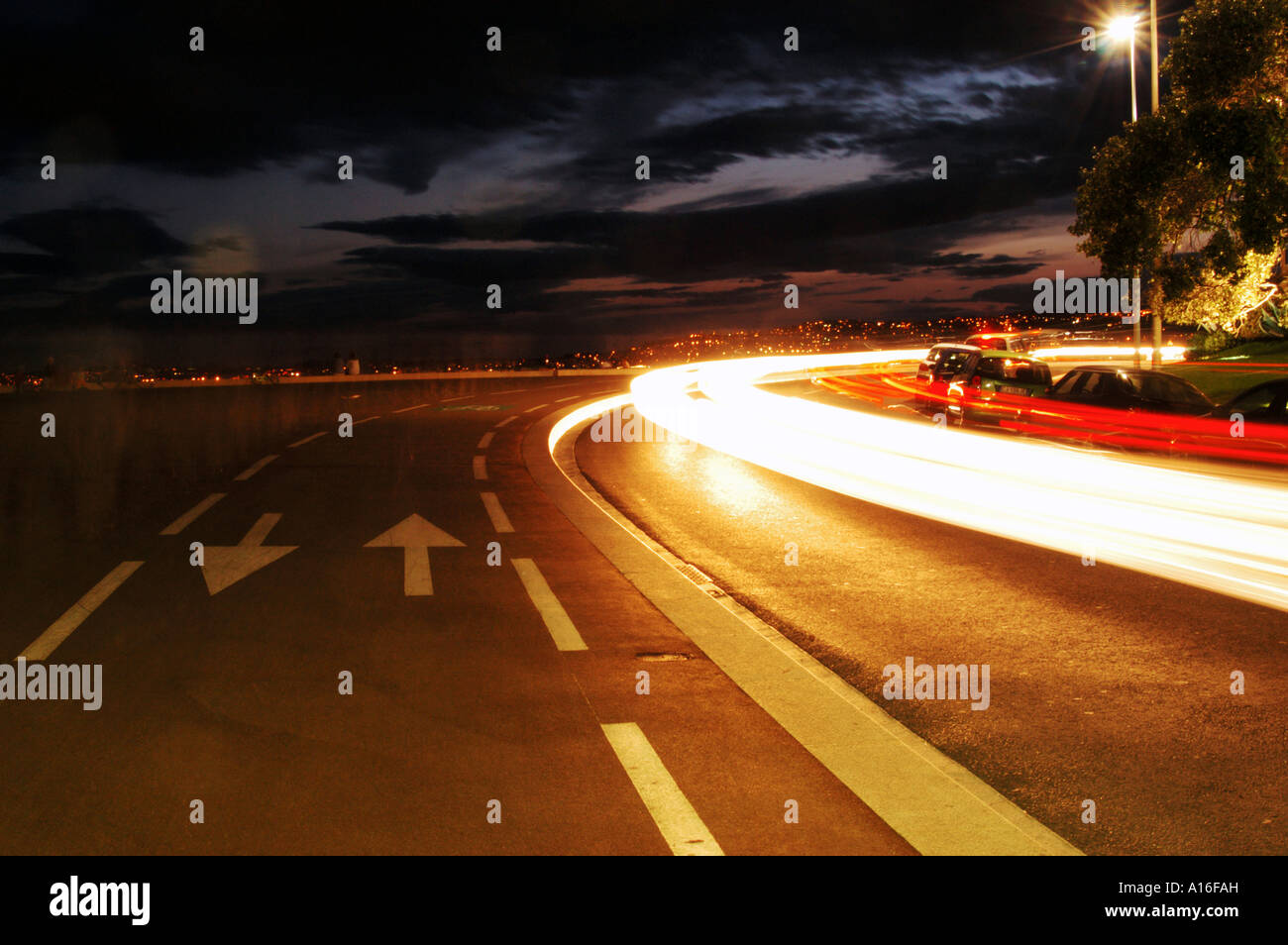 Passing traffic at night on a highway in Nice, France Stock Photo - Alamy