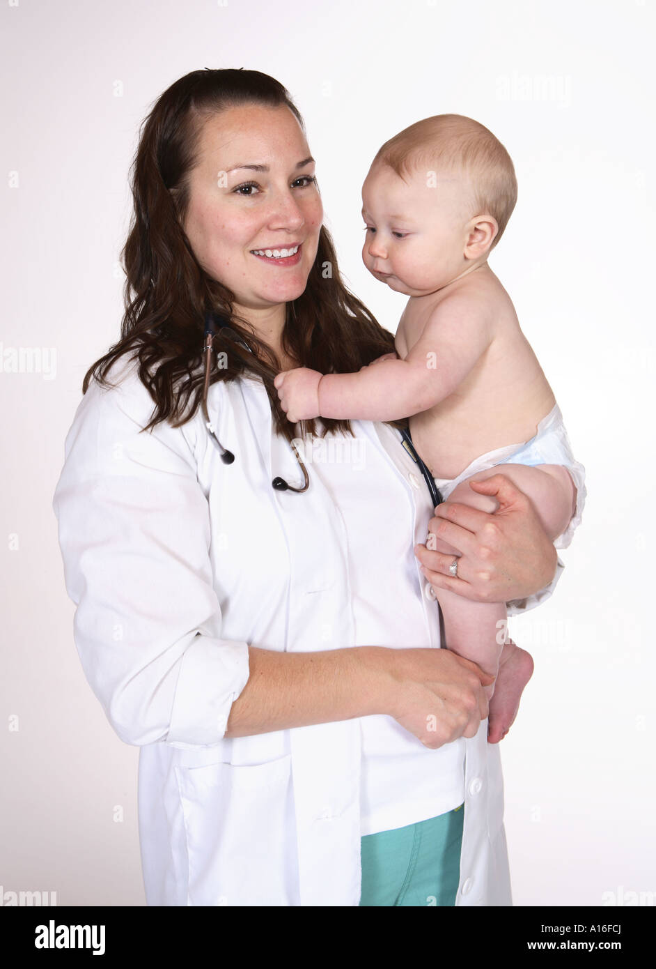 Pediatrician with Baby Stock Photo - Alamy