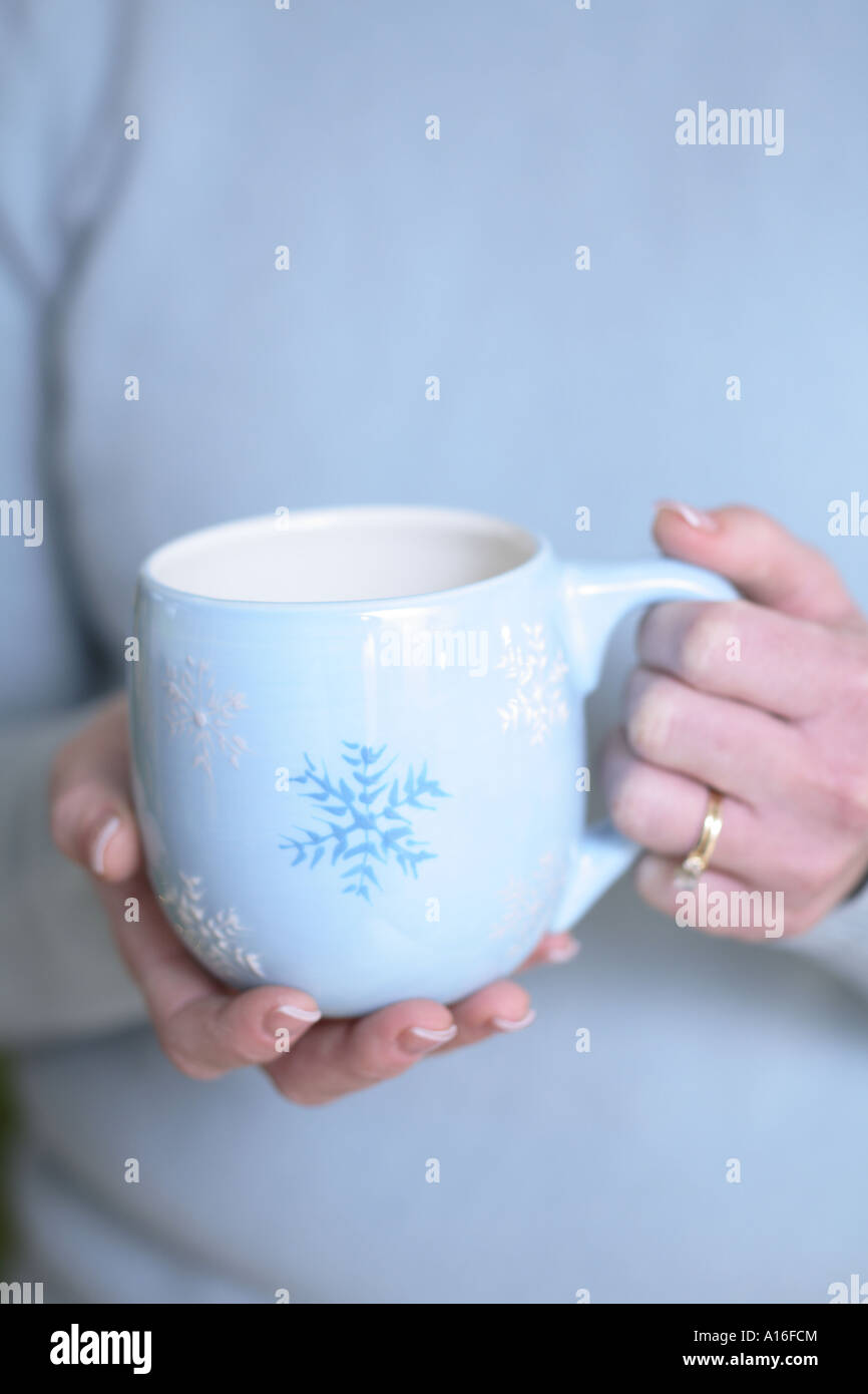 Coffee Mug in Hands Stock Photo - Alamy