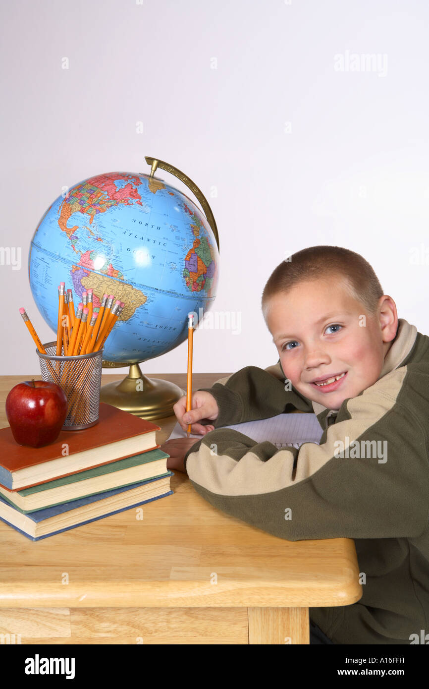Second Grade Student at Desk Stock Photo - Alamy
