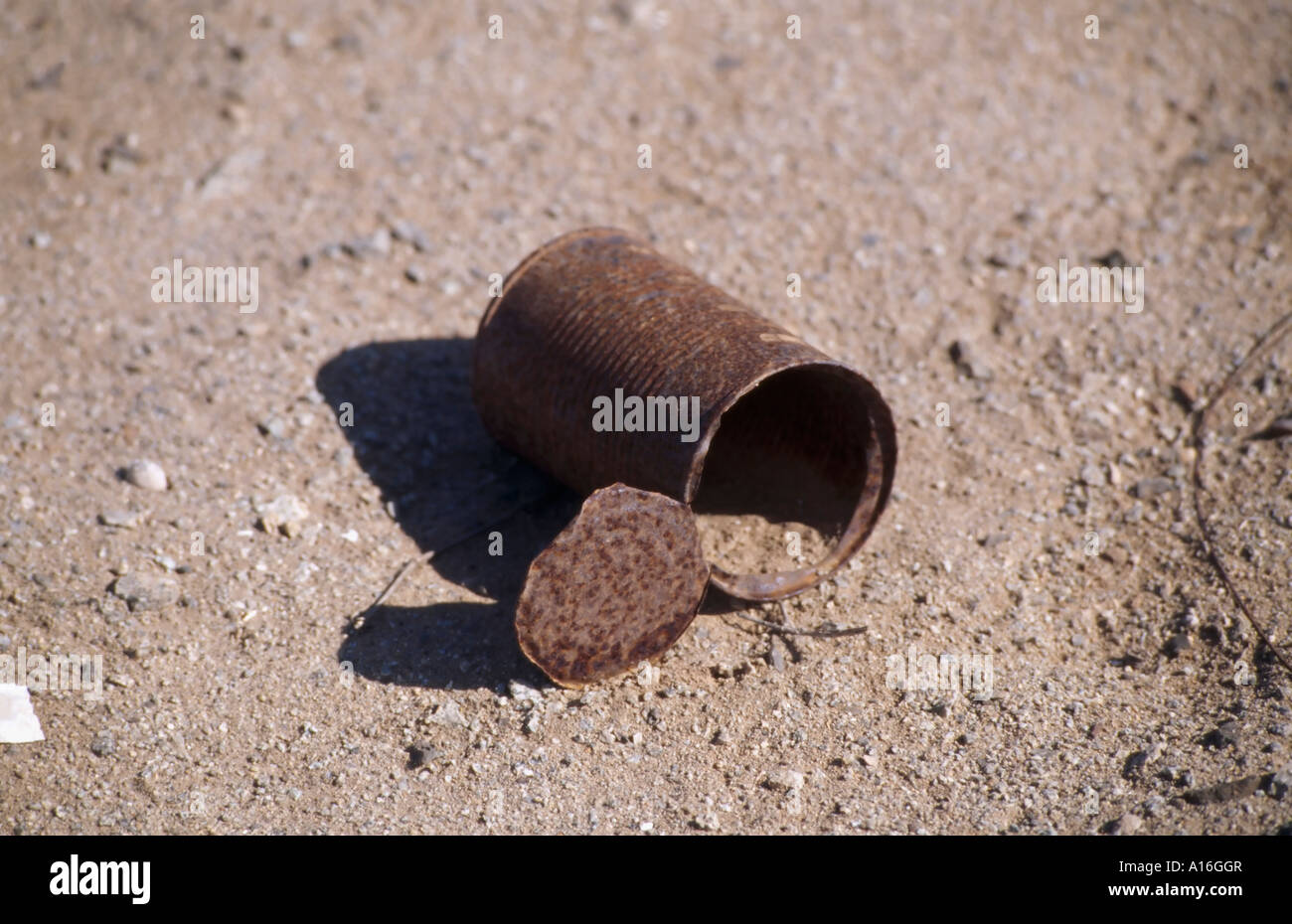 rusty tin can on floor Stock Photo - Alamy
