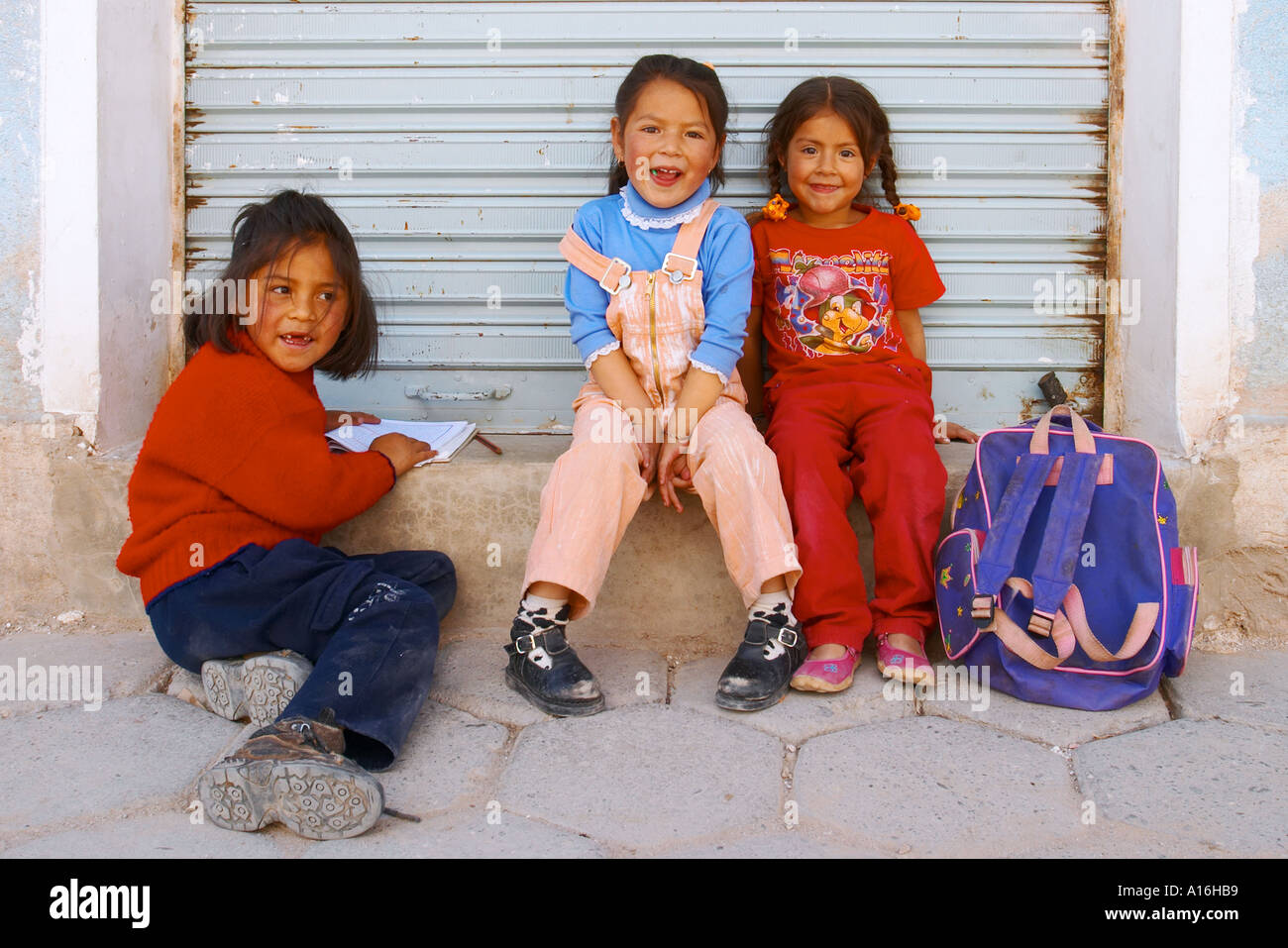 Kids playing in the town of Uyuni Stock Photo - Alamy