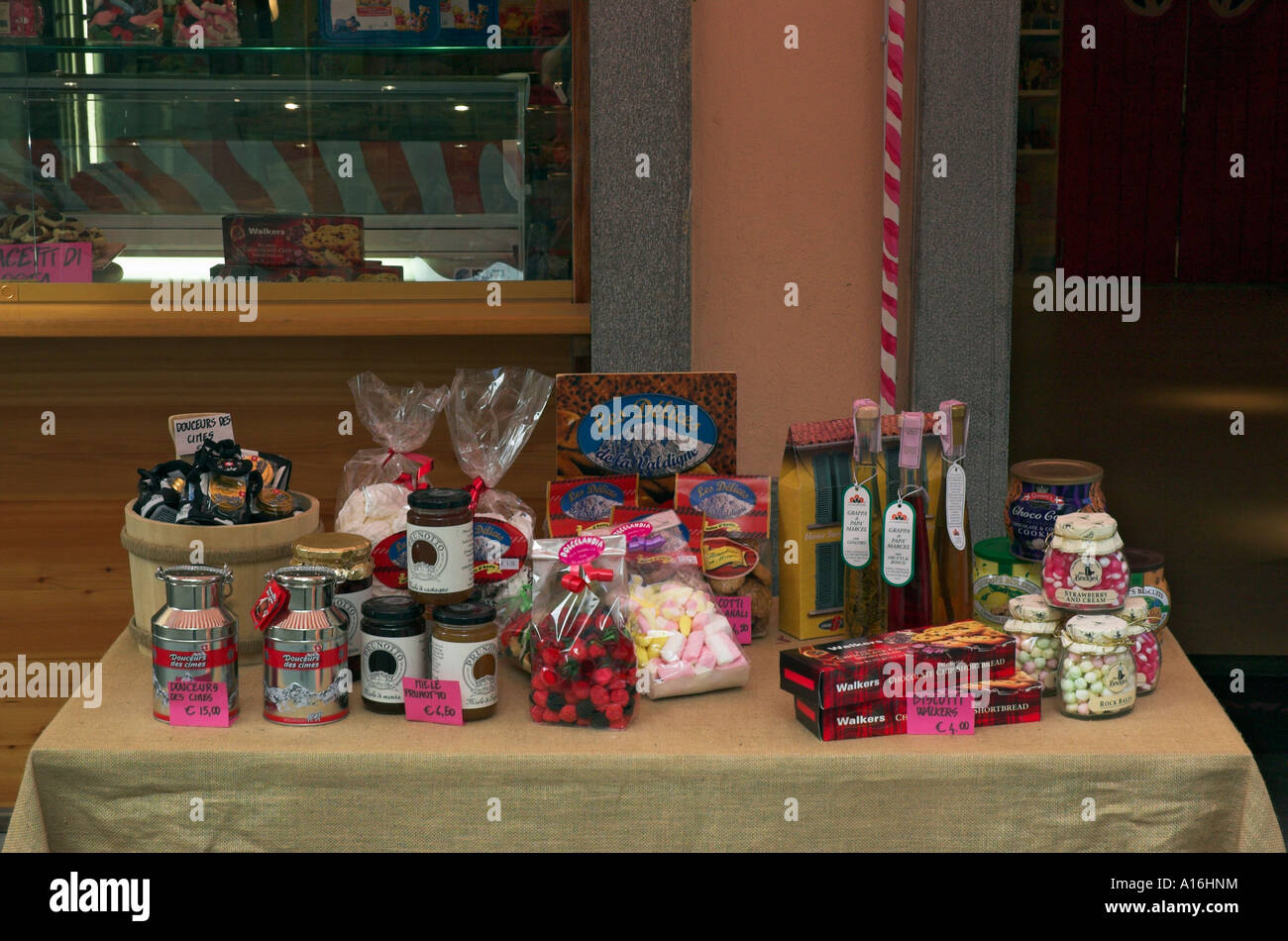 Sweets for sale at a stall outside a shop in an Italian town Stock ...