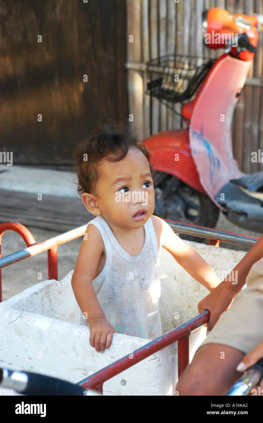 little girl with concerned expression in the philippines Stock Photo ...