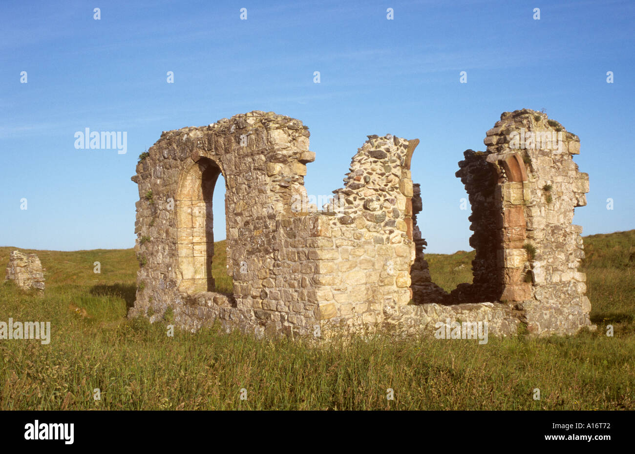 Ruins of St Dwynwens church Ynys Llanddwyn island Stock Photo - Alamy
