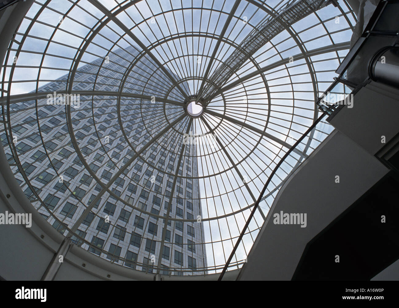 Docklands light railway station roof and Canary Wharf building in ...