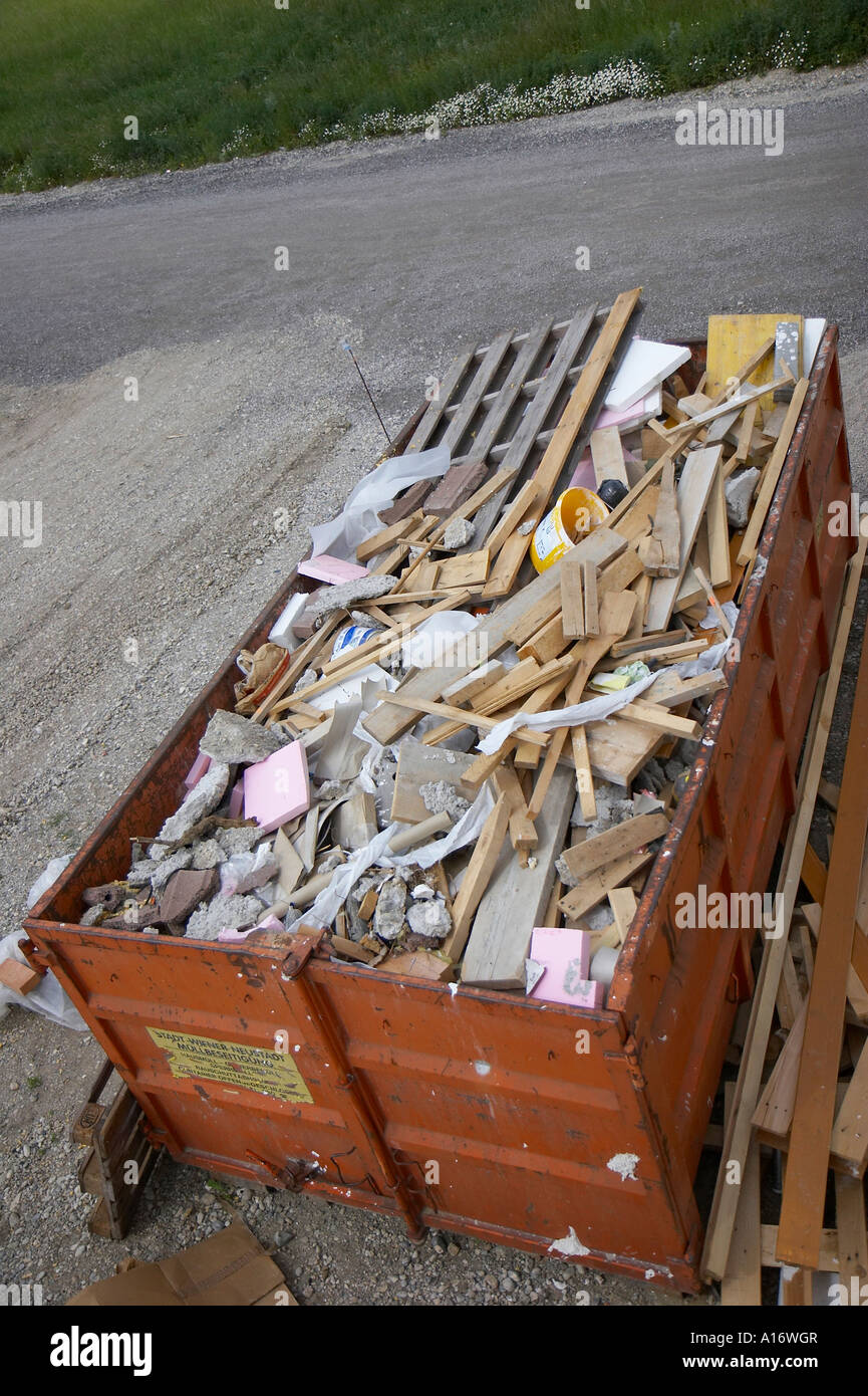 container with construction waste Stock Photo - Alamy