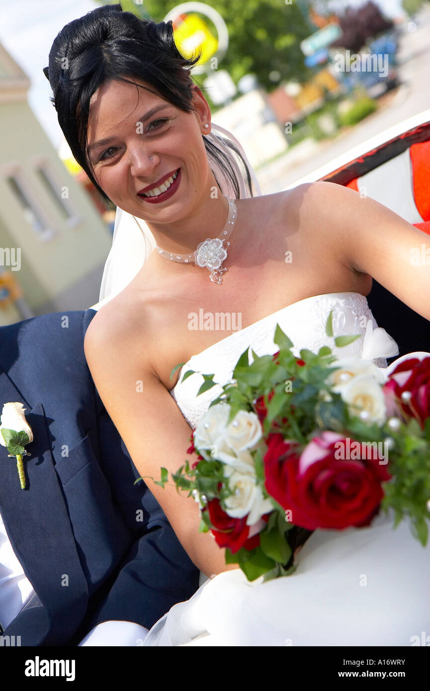 bride in wedding carriage Stock Photo - Alamy