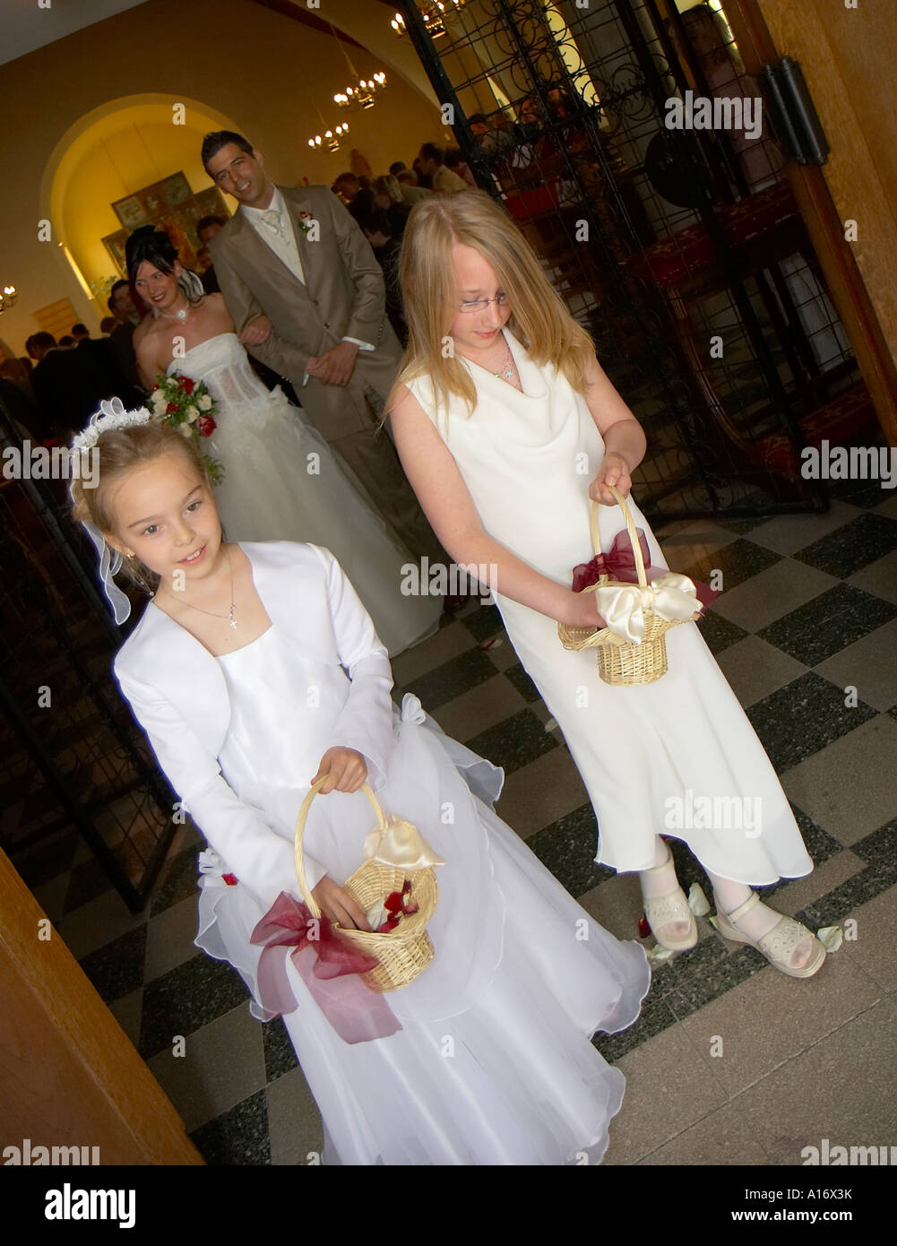 bridal couple leaving church Stock Photo - Alamy