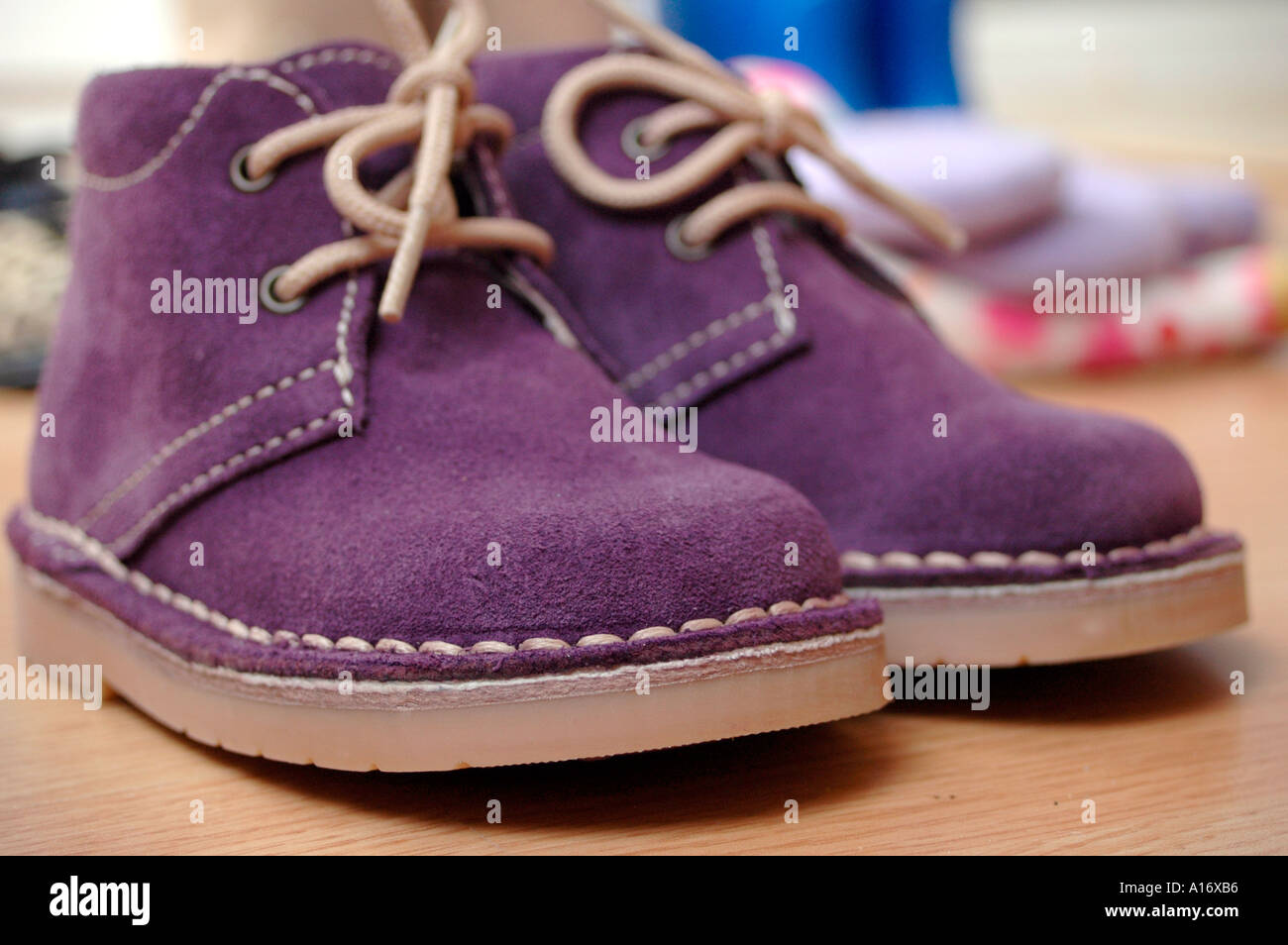 Purple suede boots hi-res stock photography and images - Alamy