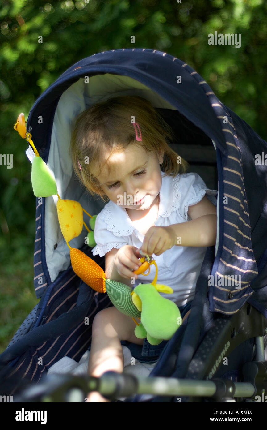 little girl in baby carriage Stock Photo - Alamy