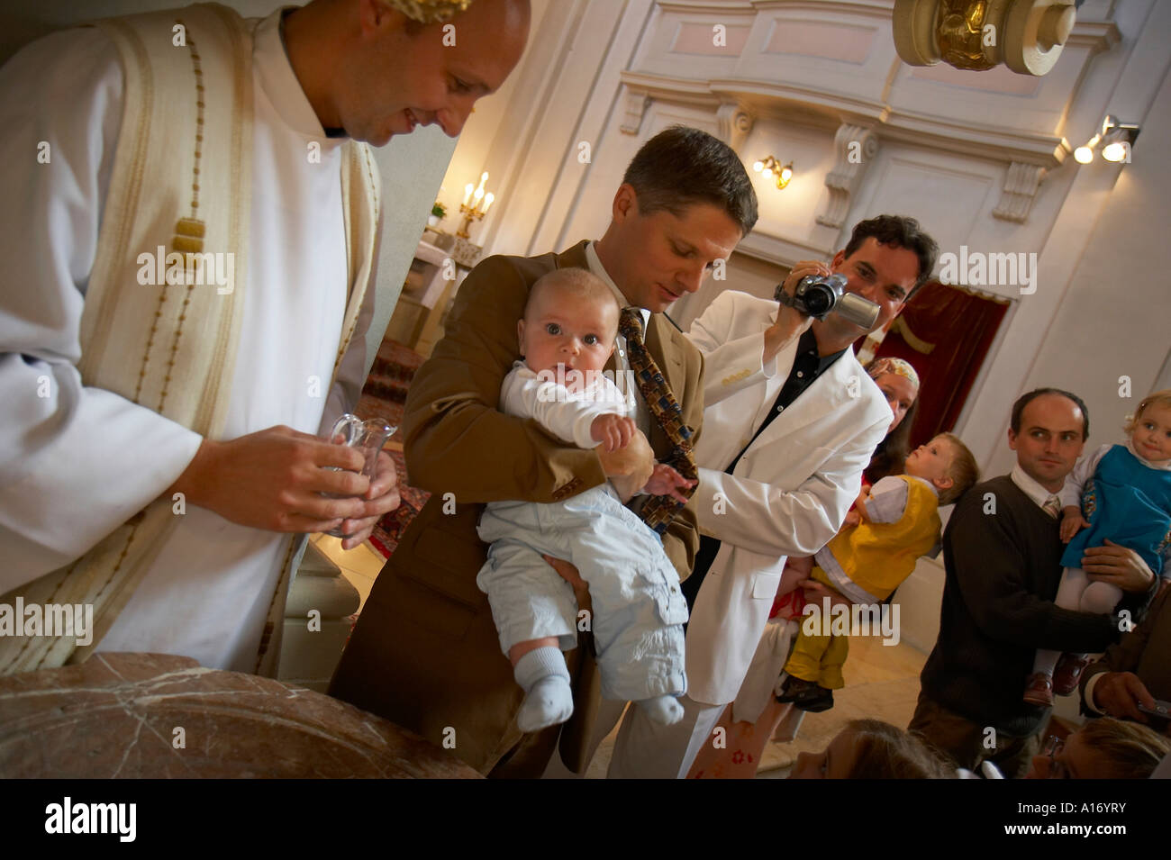 Baptism family hi-res stock photography and images - Alamy