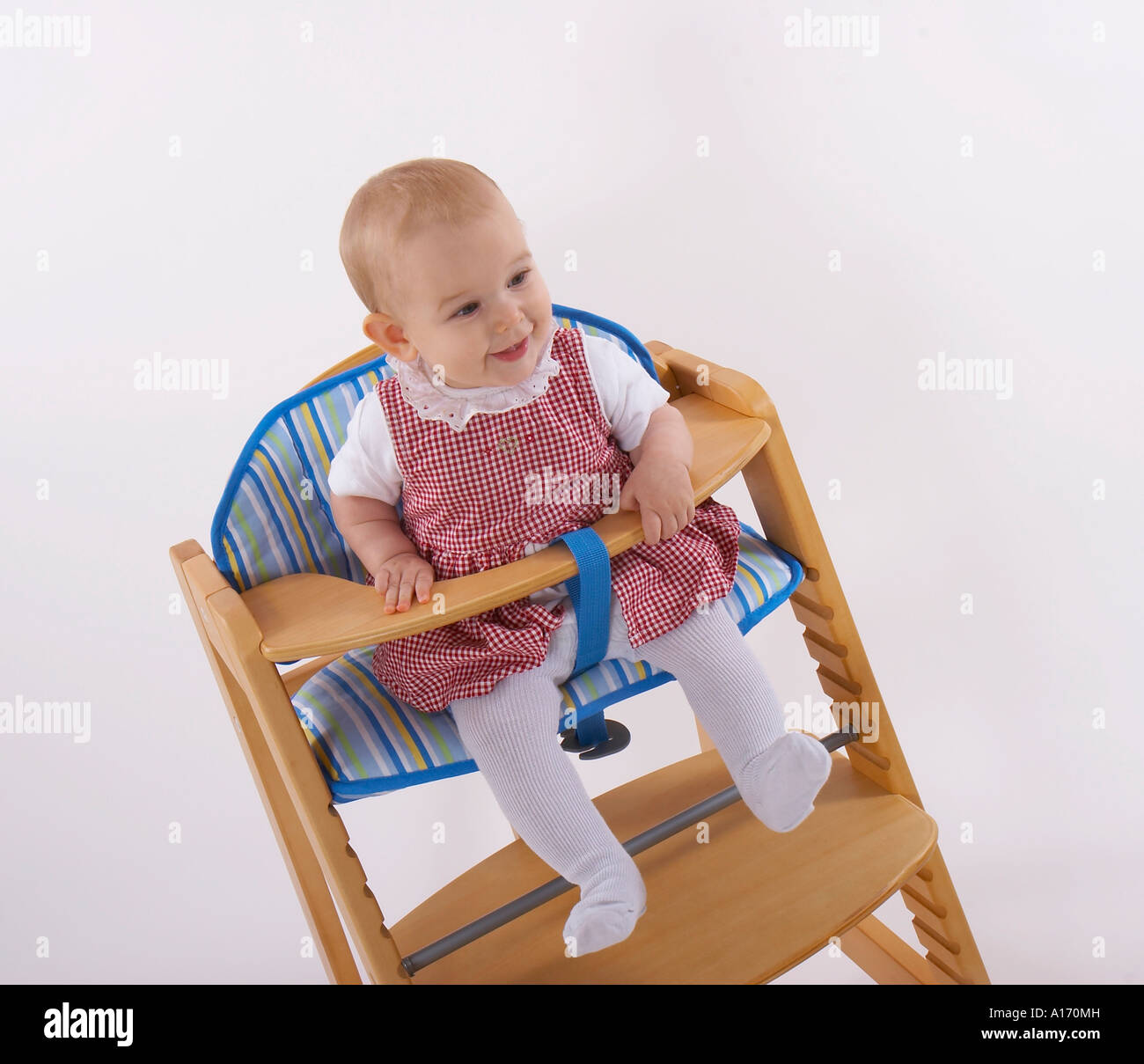 baby sitting in child seat Stock Photo - Alamy