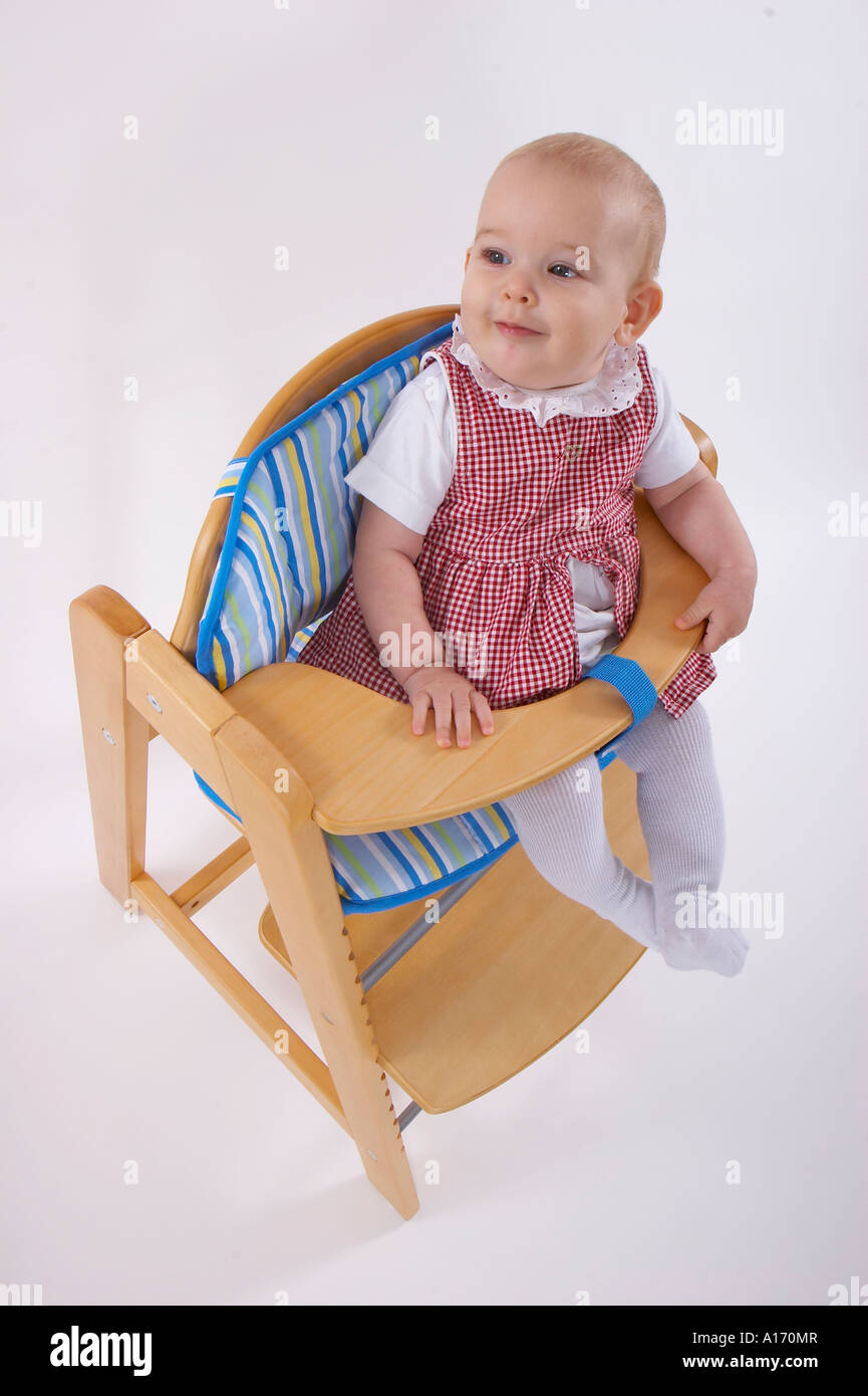 baby sitting in child seat Stock Photo - Alamy