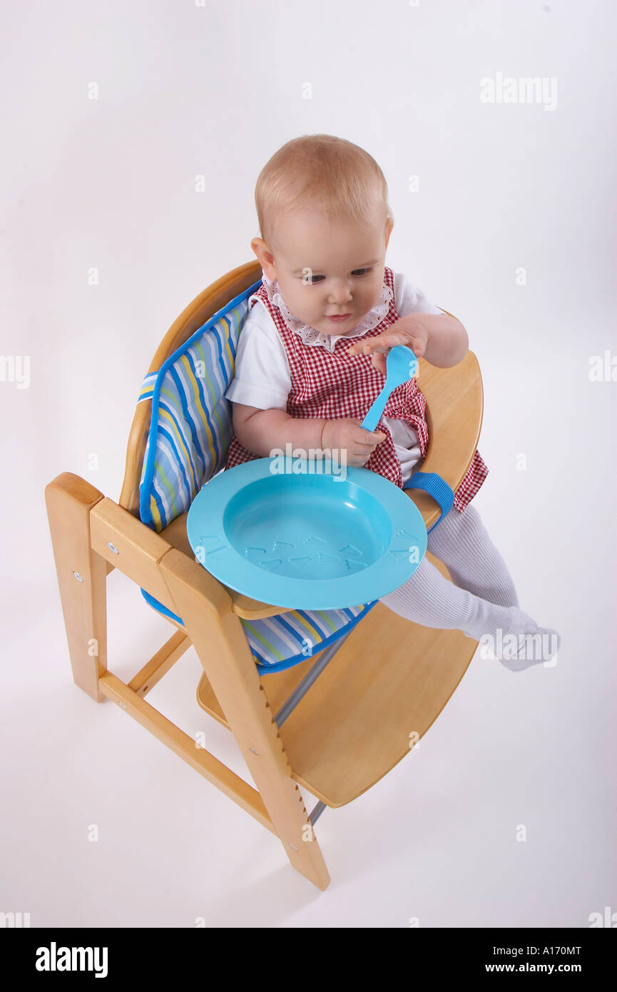 baby sitting in child seat Stock Photo - Alamy
