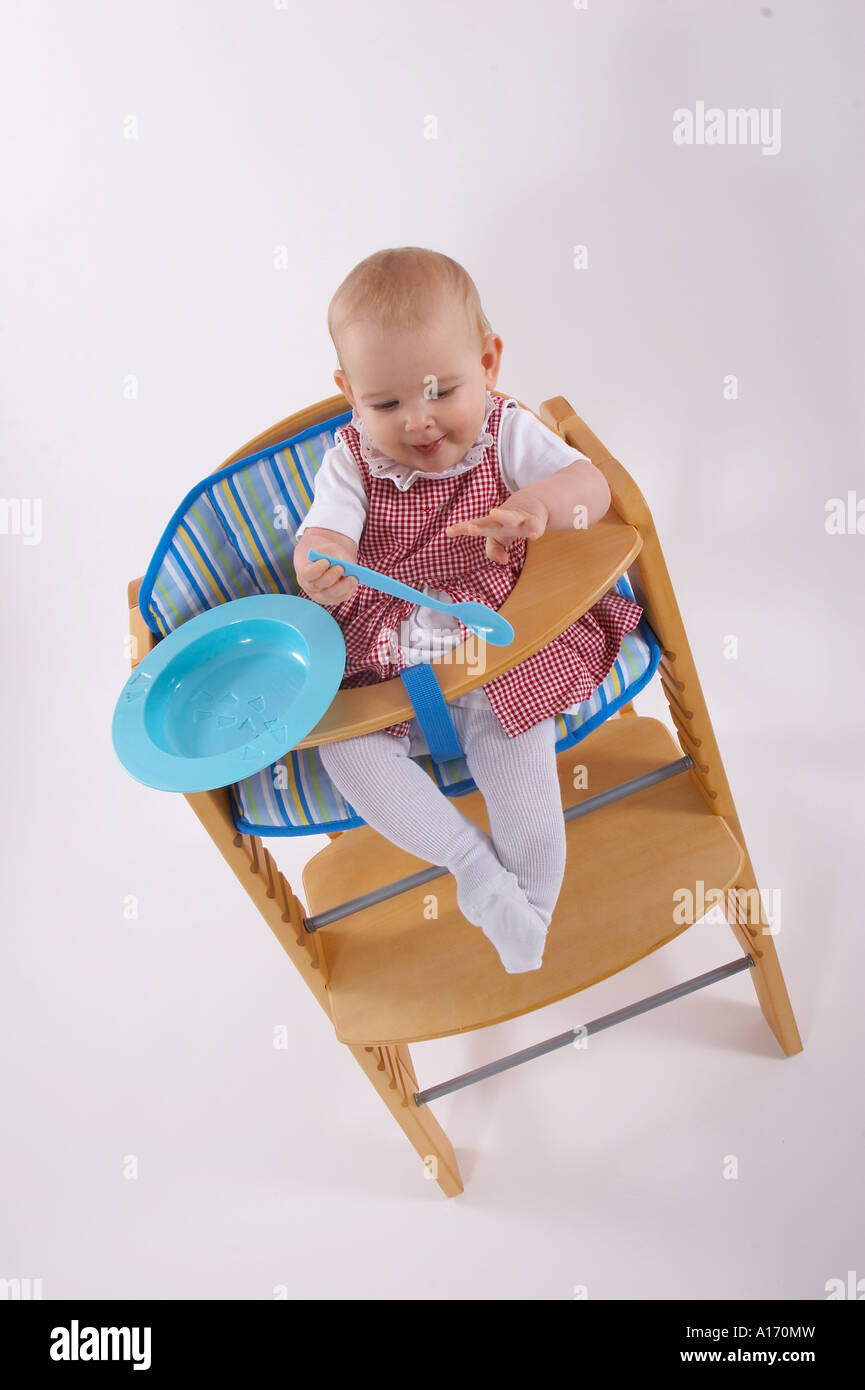 baby sitting in child seat Stock Photo - Alamy