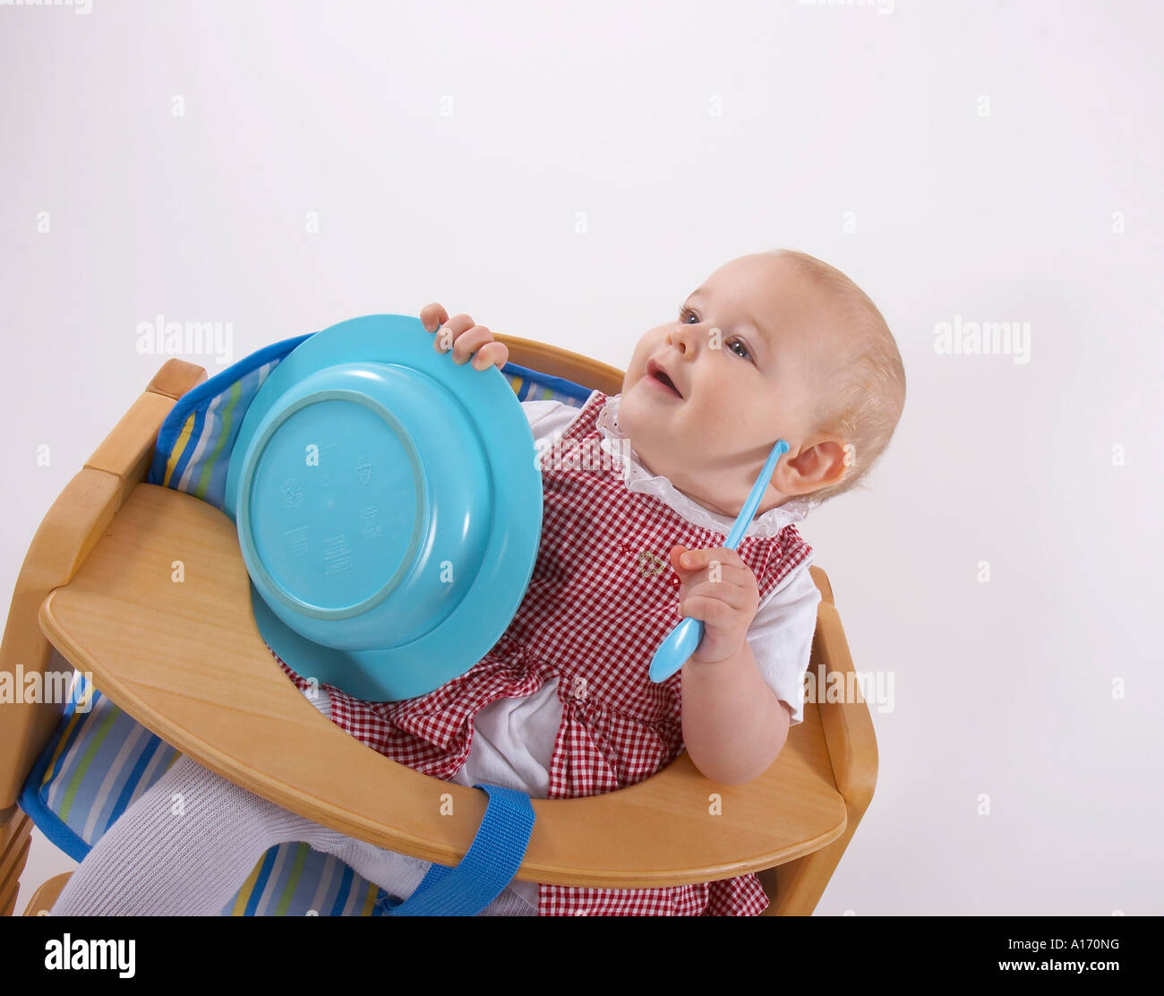 baby sitting in child seat Stock Photo - Alamy