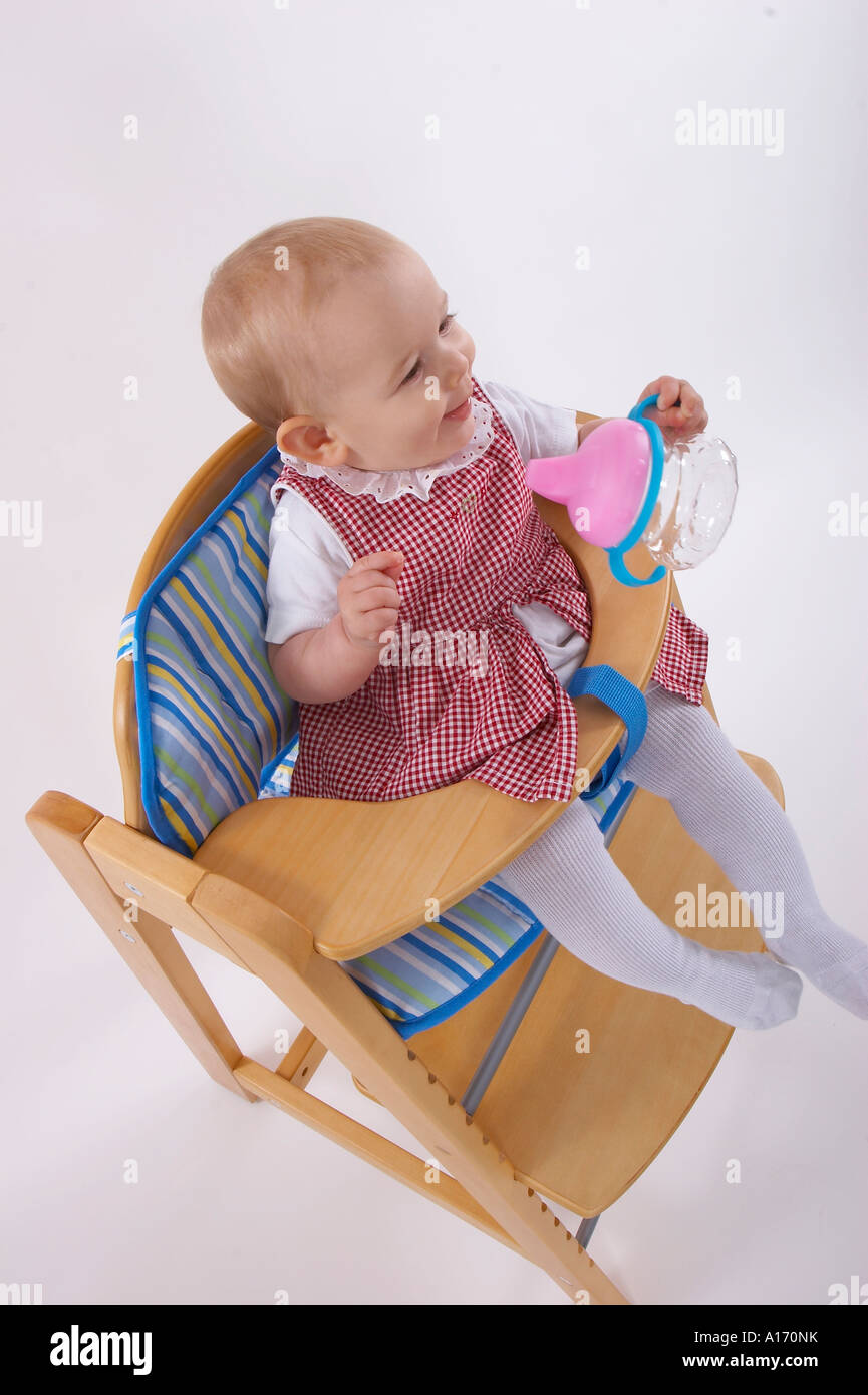 baby sitting in child seat Stock Photo - Alamy