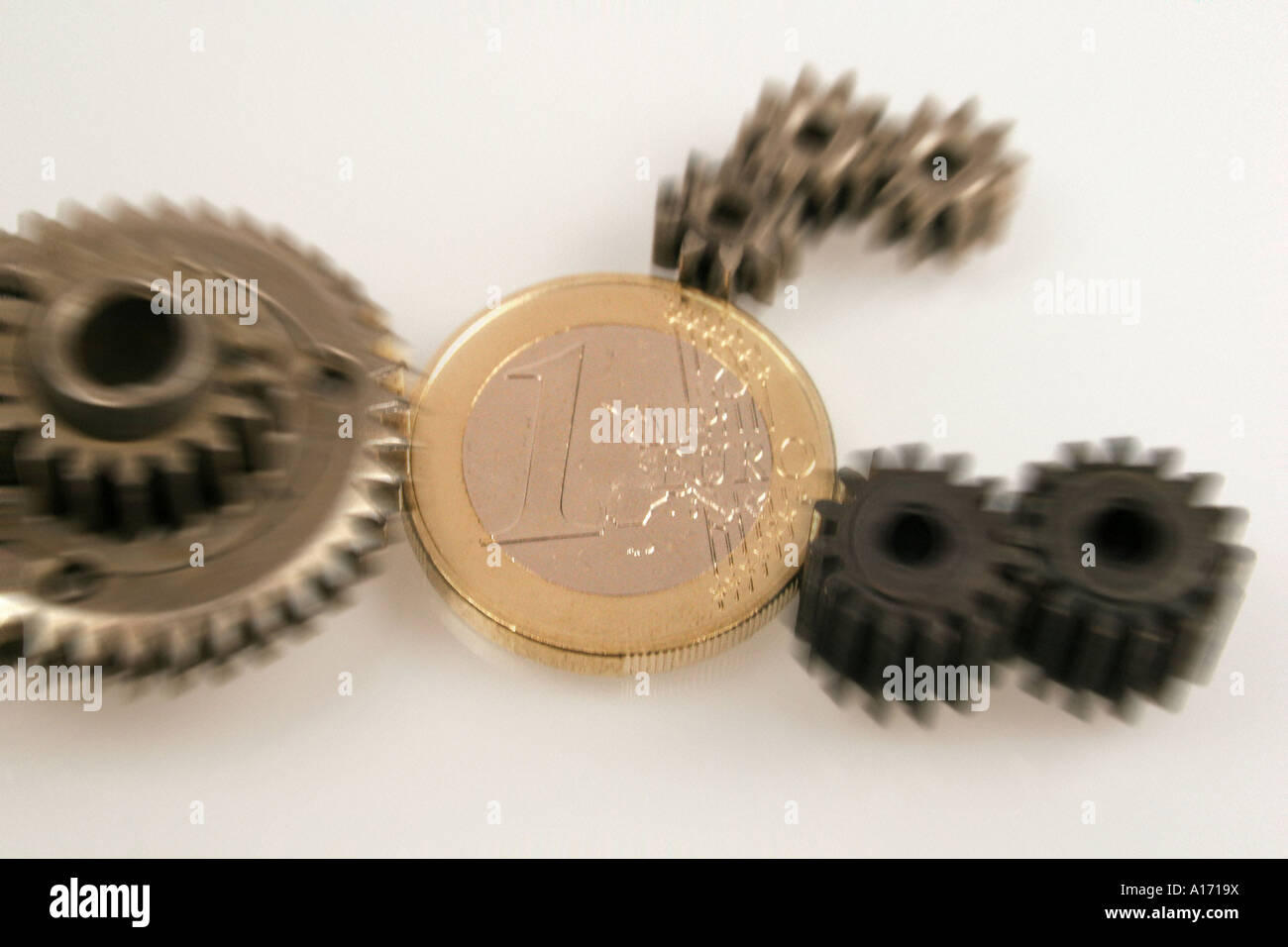 cogwheels / gearwheels with coin Stock Photo - Alamy