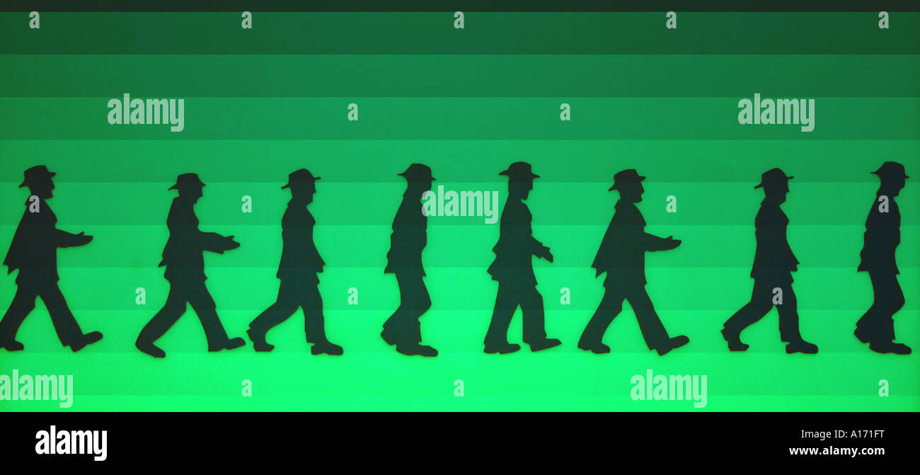 men on a green back Stock Photo - Alamy