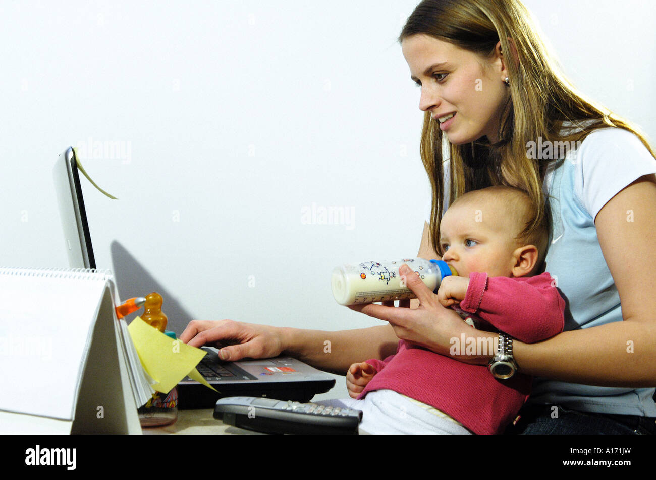 telework and childcare Stock Photo - Alamy